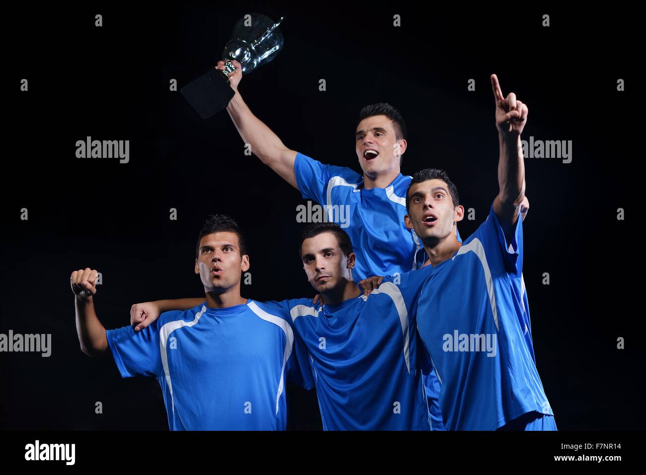 soccer players team group celebrating the victory and become champion ...