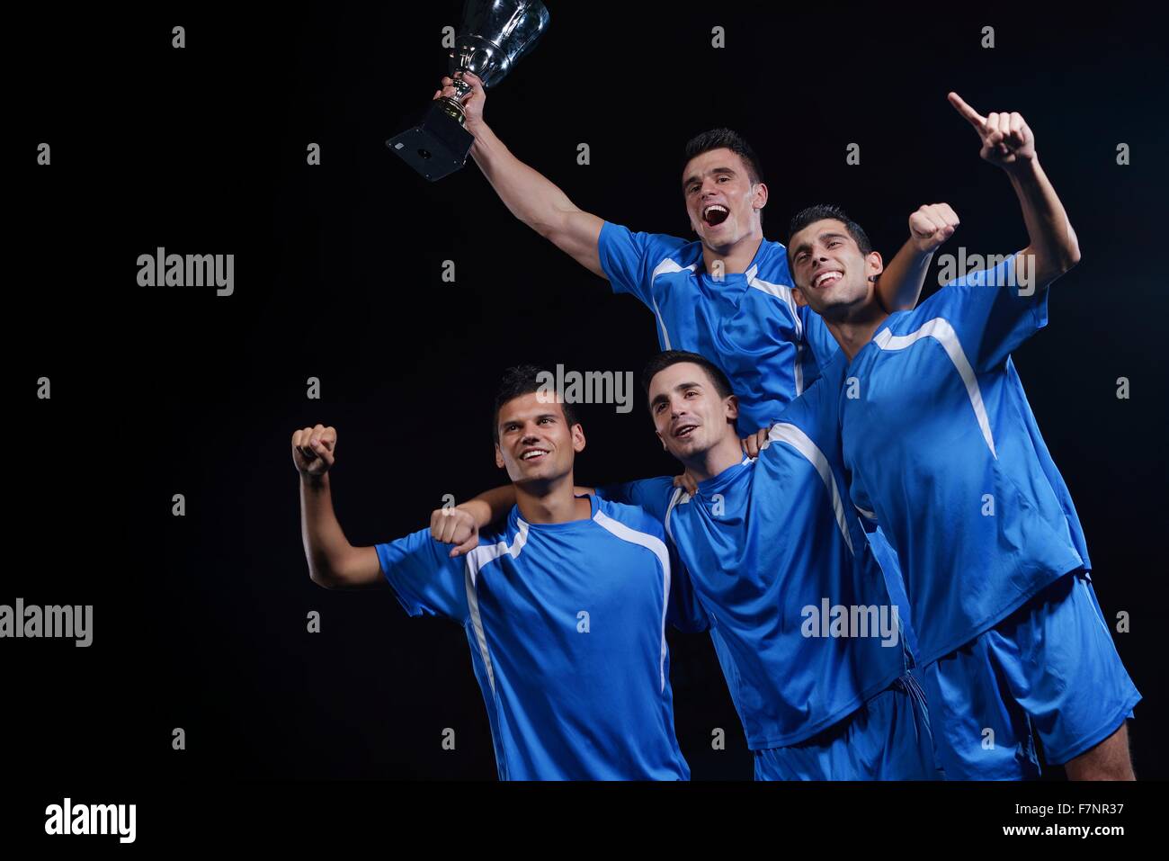 soccer players team group celebrating the victory and become champion ...