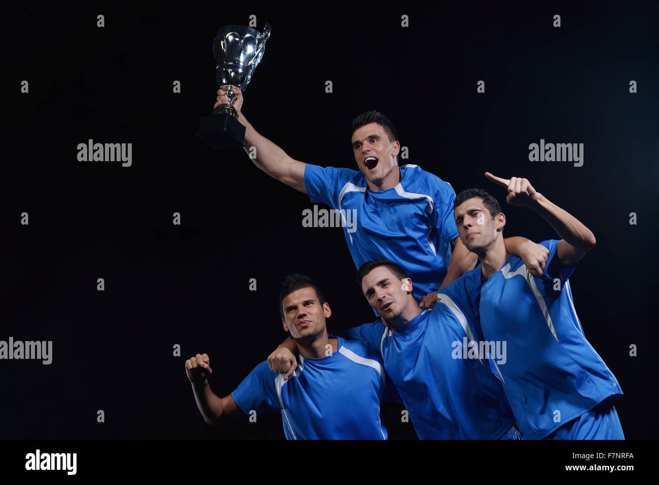 soccer players team group celebrating the victory and become champion ...