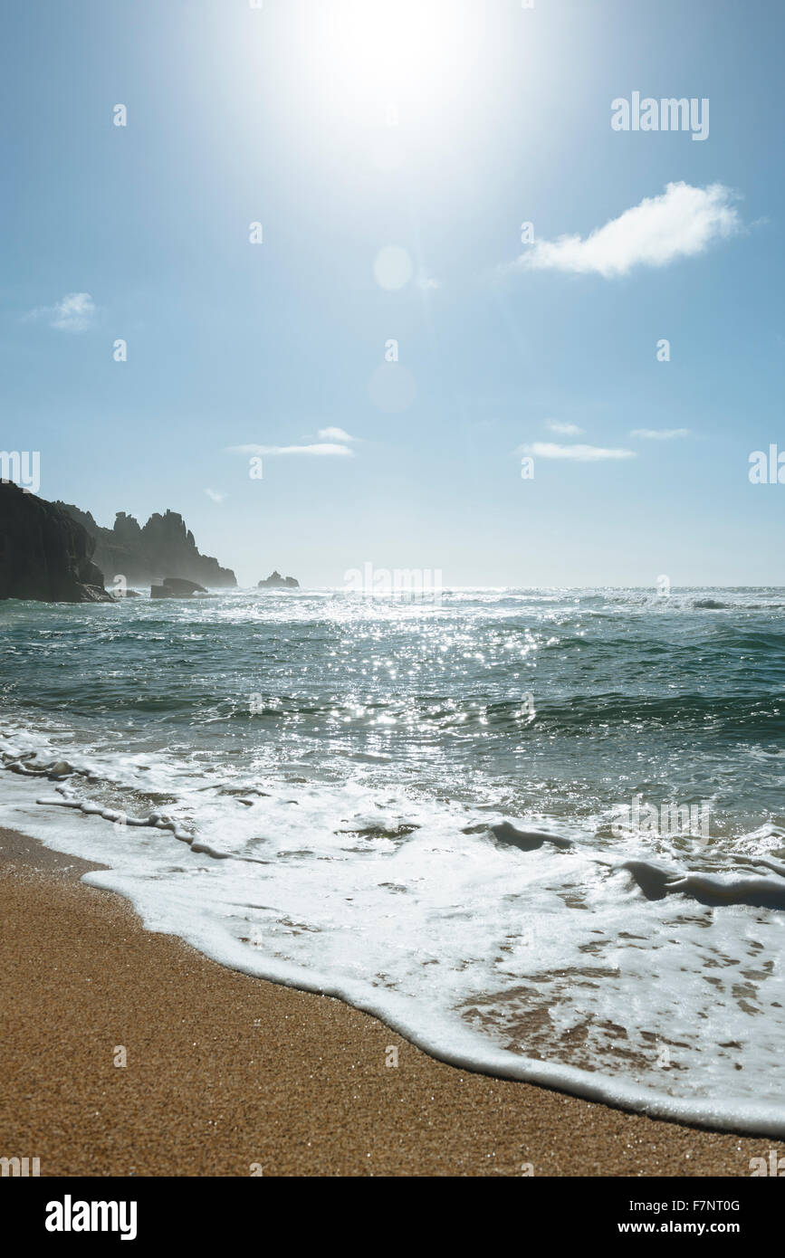 Bright Autumn sunshine over PEDNEVOUNDER Beach, South Cornwall. Early ...