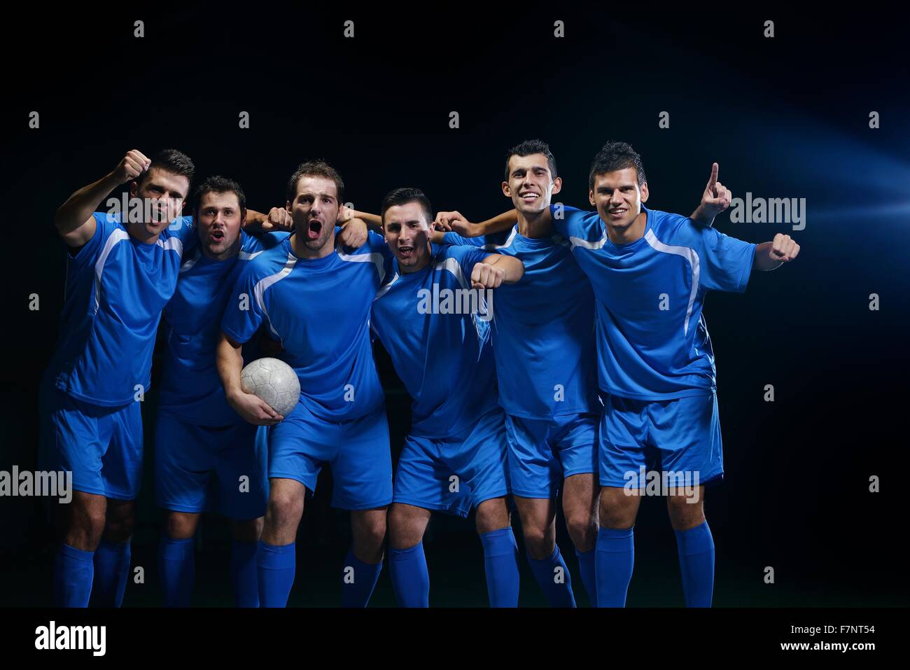 soccer players team group celebrating the victory and become champion ...