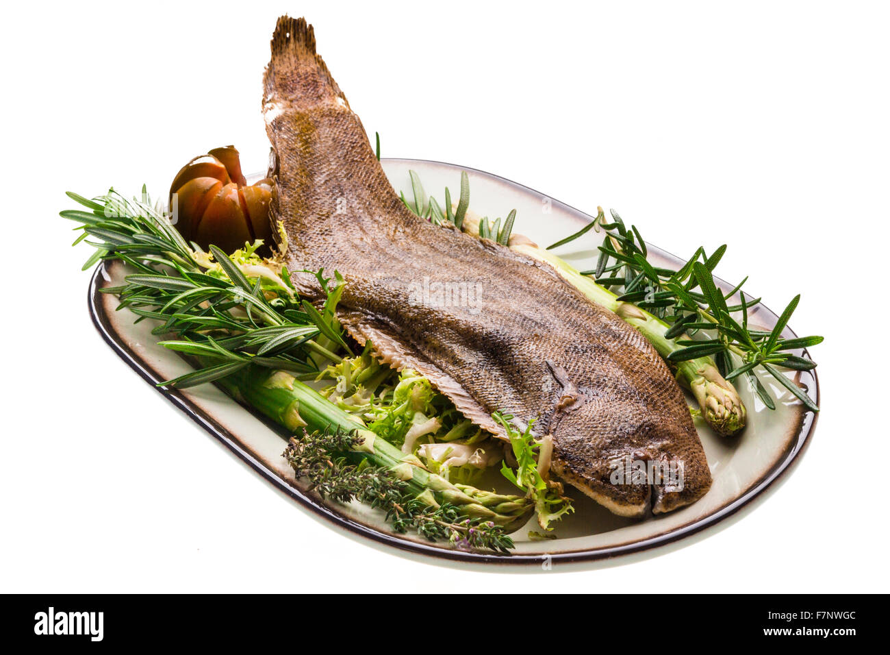 Fish Dover sole roasted Stock Photo - Alamy