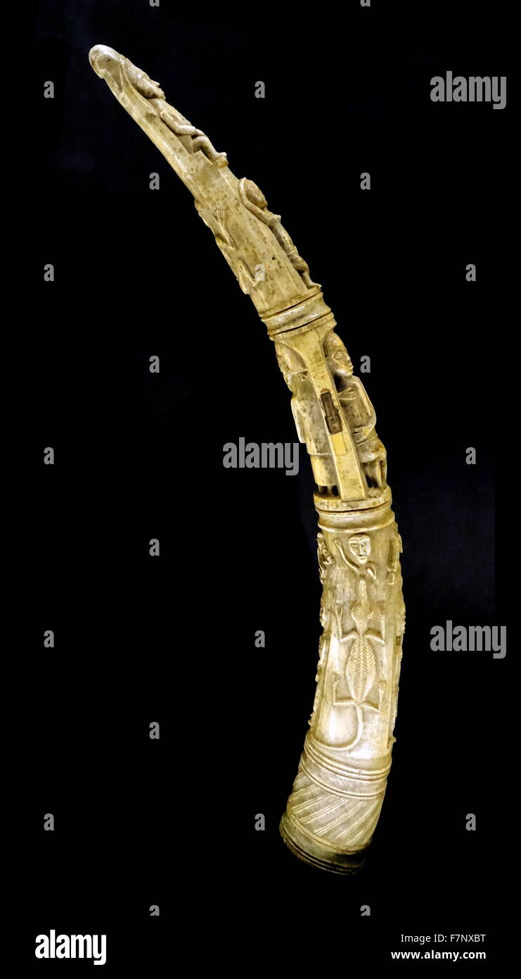 Carved elephant tusk with intricate detail. From the Congo, The ...
