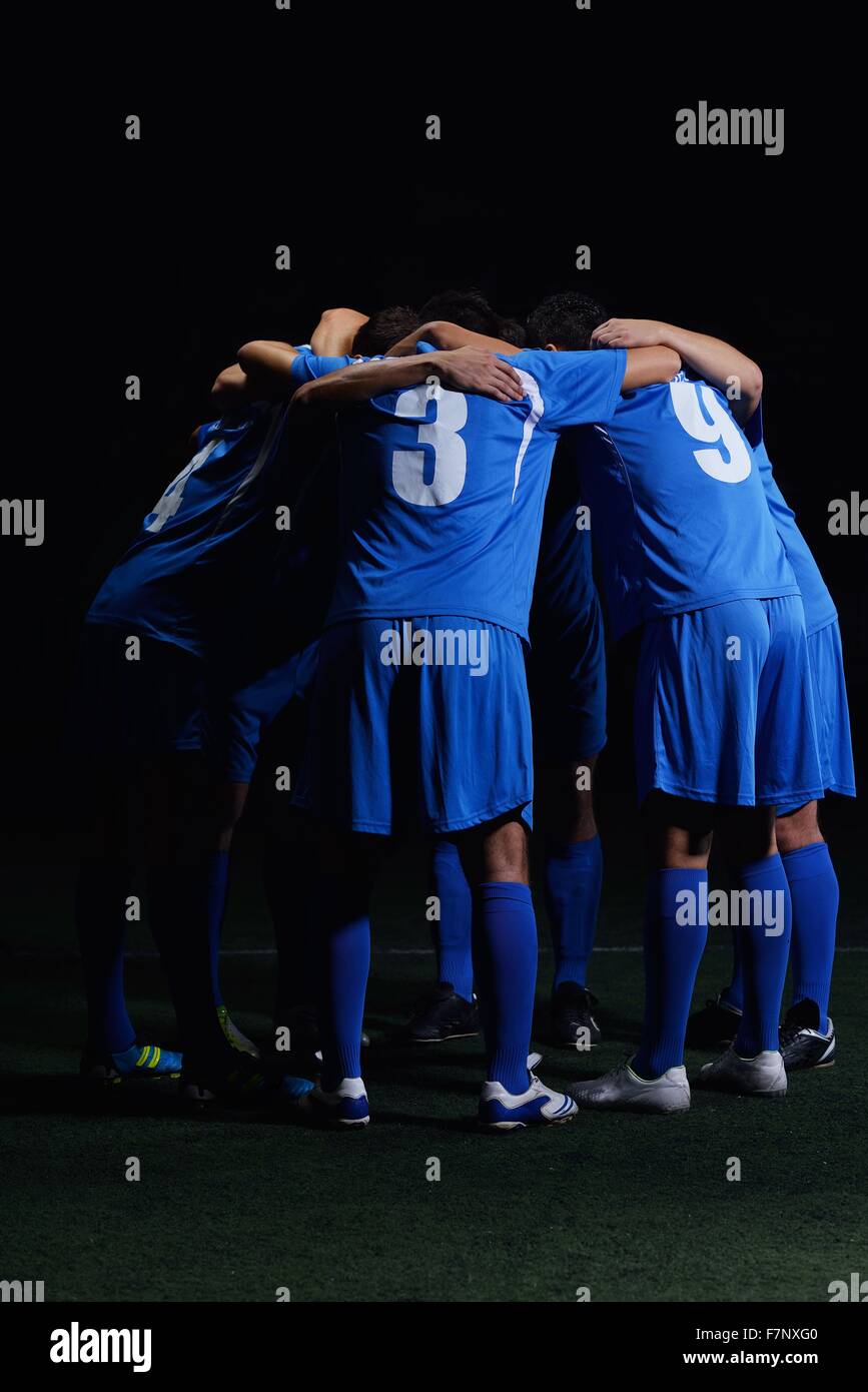 soccer players team group isolated on black background Stock Photo - Alamy