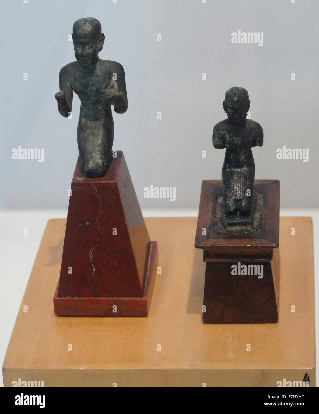 Egyptian statuettes of a Praying priest and pharaoh. Bronze. Late ...