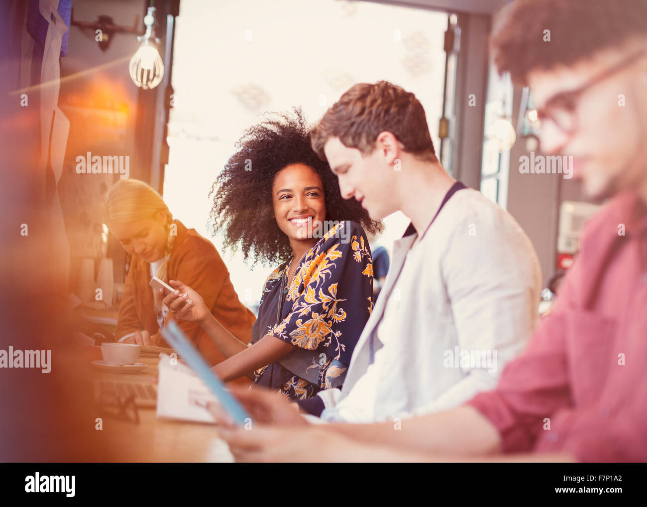 Four friends cafe hi-res stock photography and images - Alamy