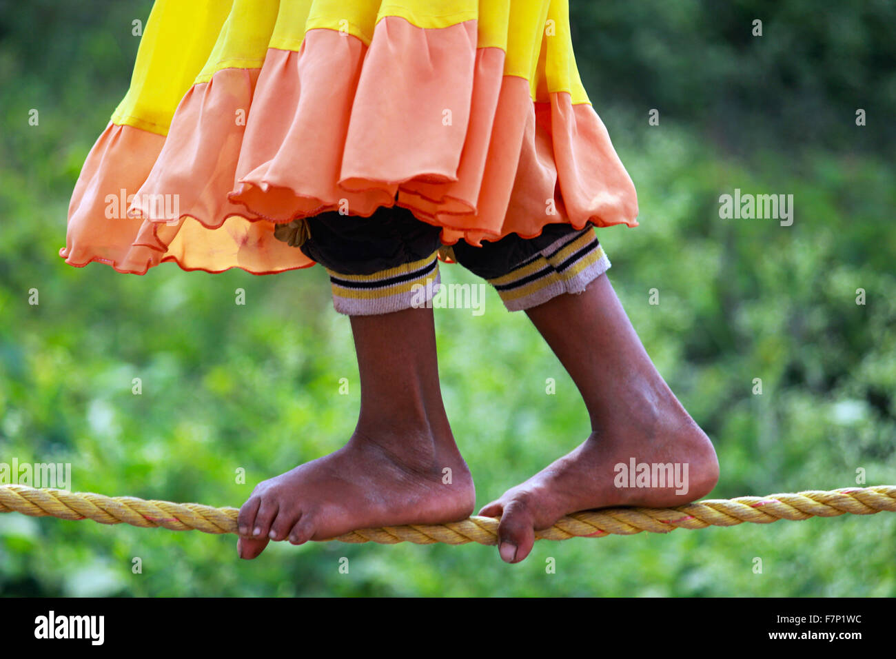 Girl balancing on rope walk hi-res stock photography and images - Alamy