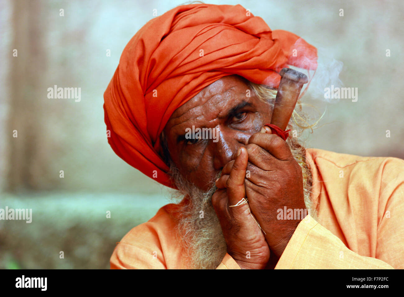 Sadhu smoking chillum kumbh mela hi-res stock photography and images ...