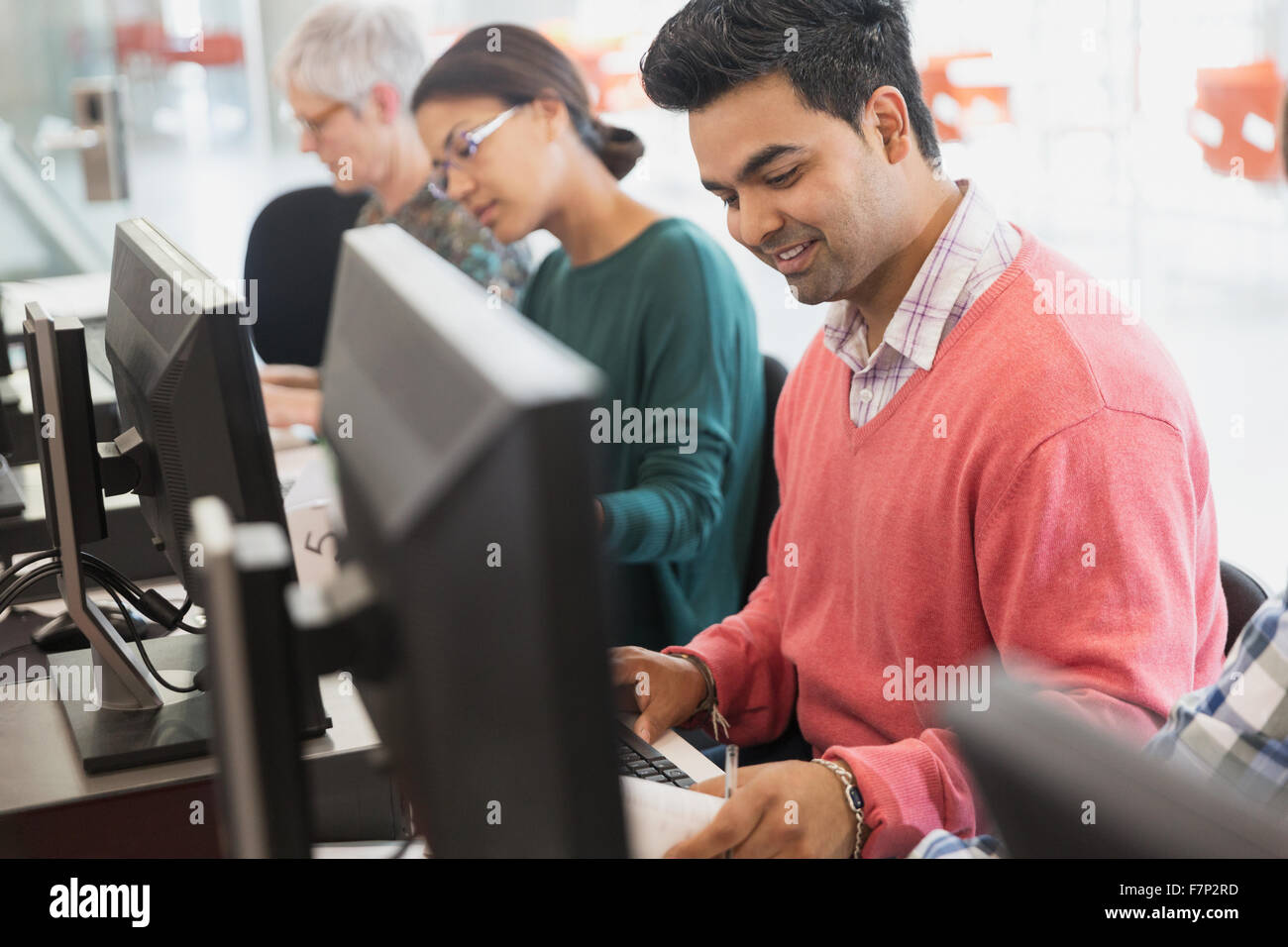 Adult african student learning computer hi-res stock photography and ...