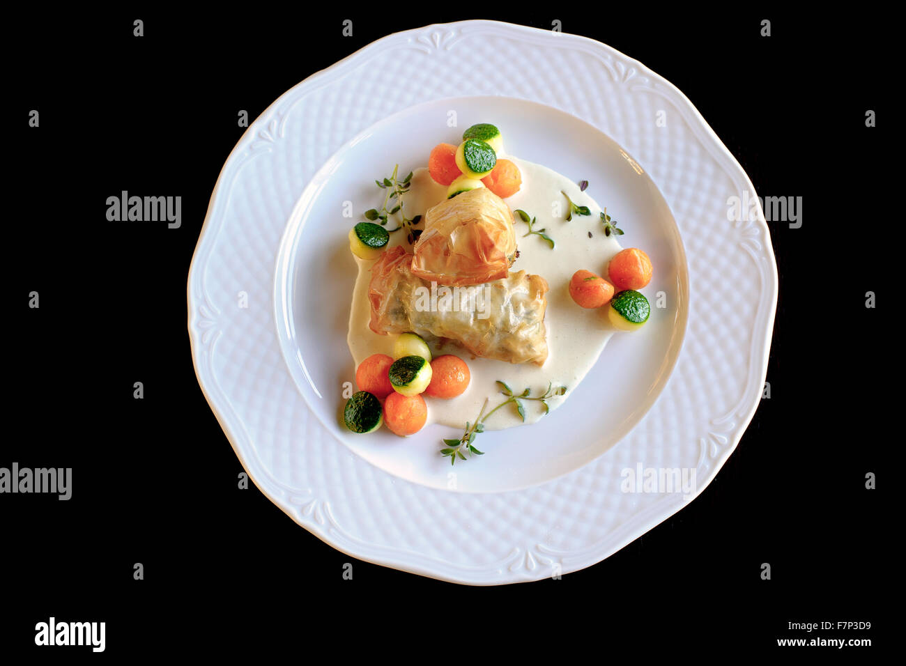 fried turbot fillet in Filo pastry with vegetables and sauce Stock ...