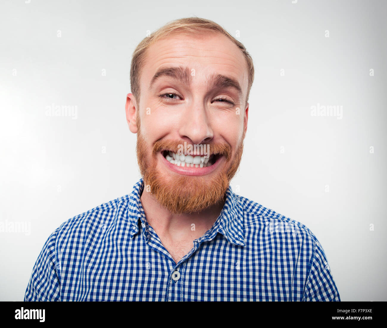 Portrait of a funny man smiling isolated on a white background Stock ...
