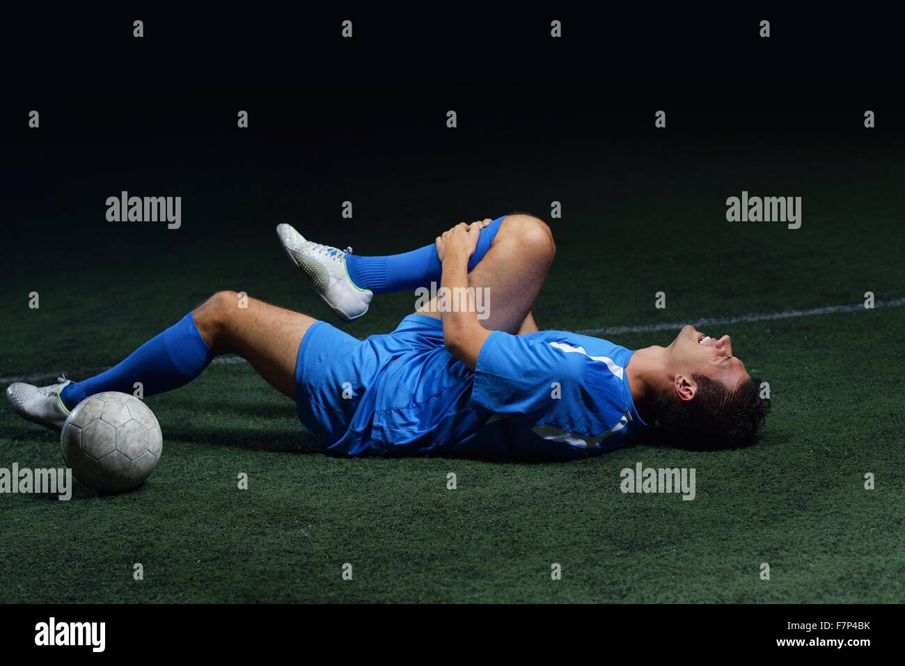 soccer player have pain injury accident on football game Stock Photo ...