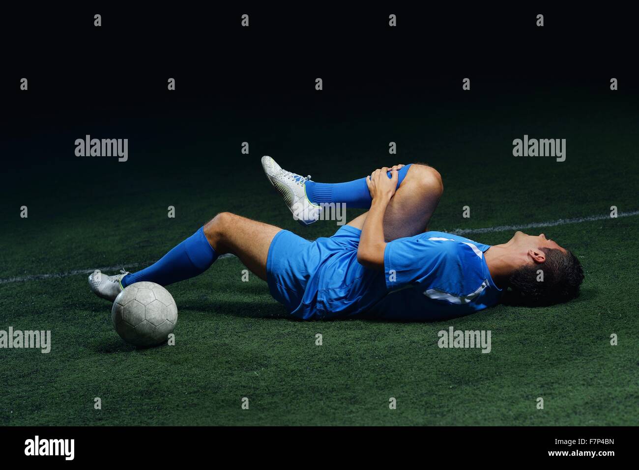 soccer player have pain injury accident on football game Stock Photo ...