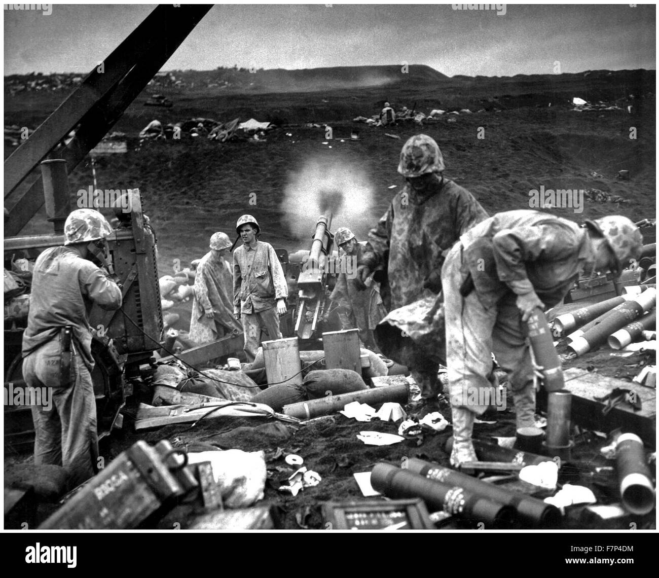 Photograph of Artillery pumps a stream of shells into Japanese positions. Dated 1943 Stock Photo ...