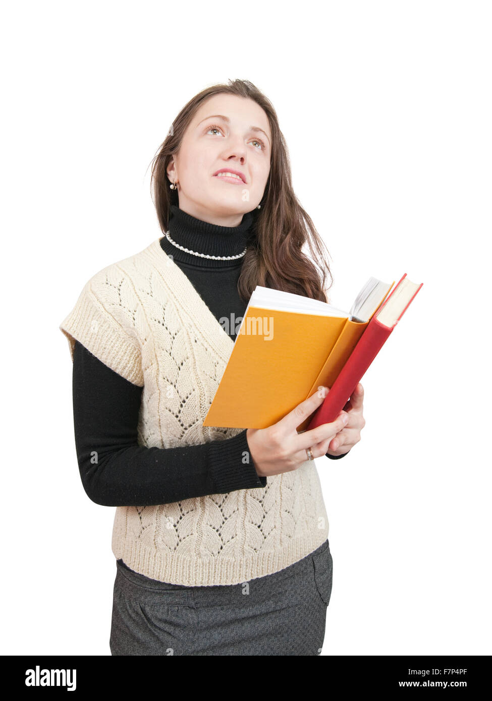 Standing girl reading book, isolated over white Stock Photo - Alamy