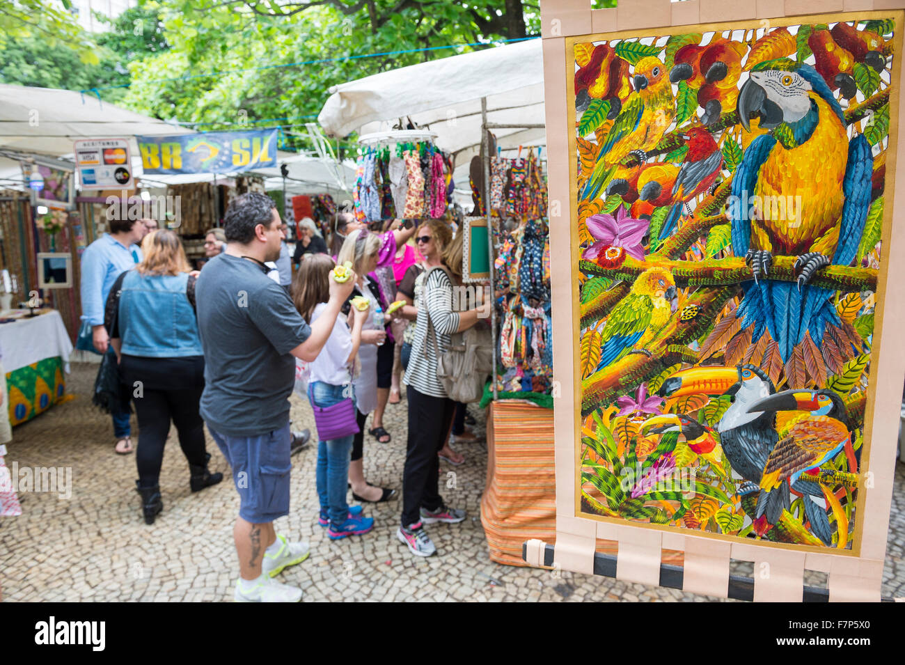 RIO DE JANEIRO, BRAZIL - OCTOBER 25, 2015: Shoppers look at art ...