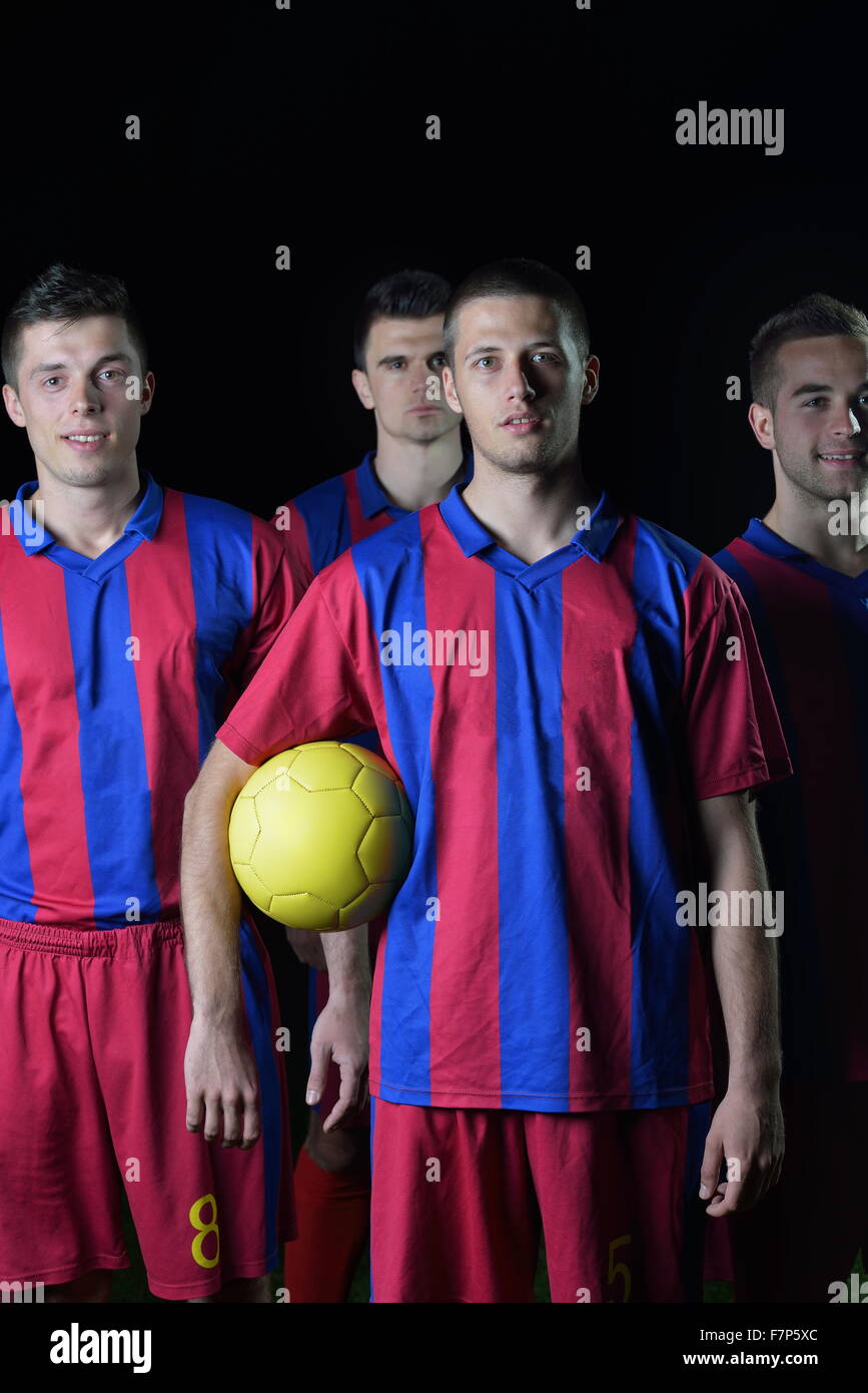 soccer players team group isolated on black background Stock Photo - Alamy