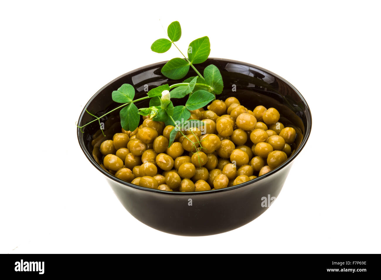 Marinated green peas with branch Stock Photo - Alamy