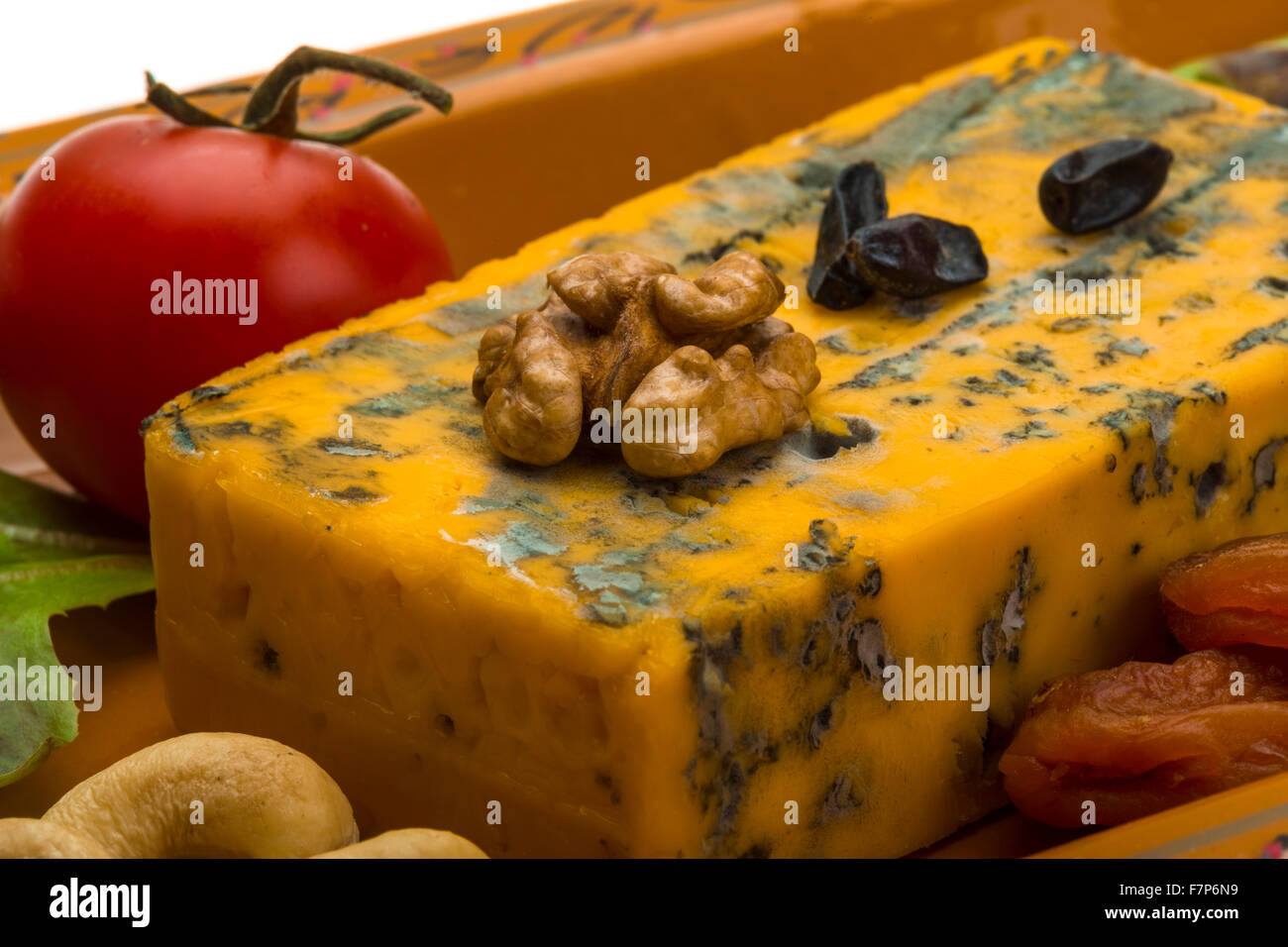Gold cheese with mould Stock Photo - Alamy