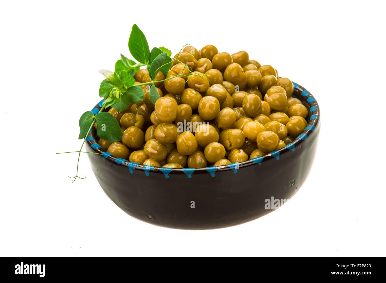 Marinated green peas with branch Stock Photo - Alamy