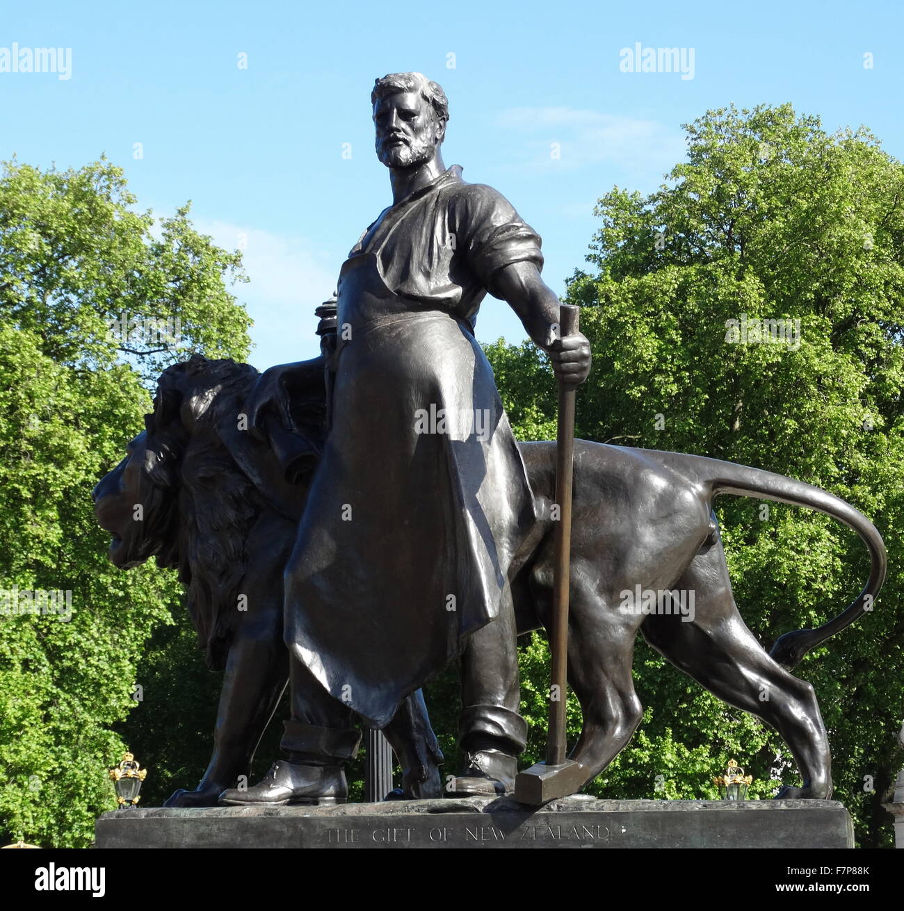 figure representing Manufacture (a blacksmith in modern costume with a ...