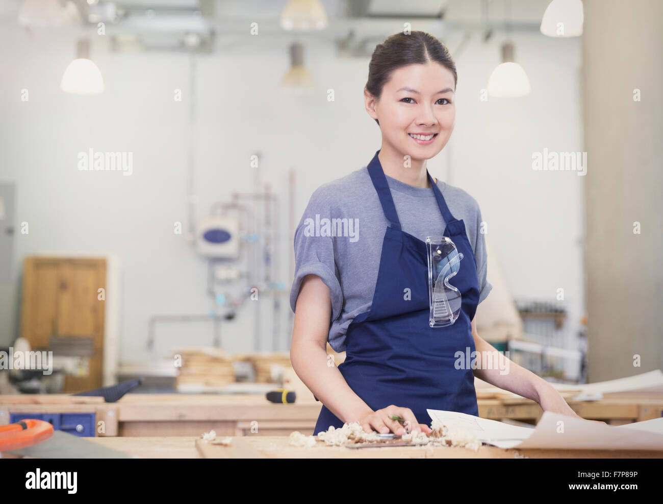 Female carpenter blueprint in hi-res stock photography and images - Alamy