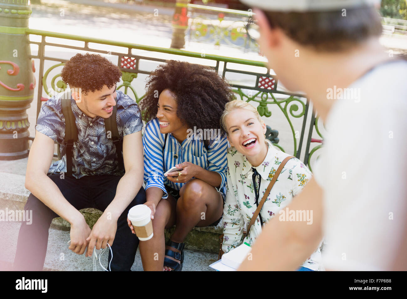 Friends hanging out park hi-res stock photography and images - Alamy