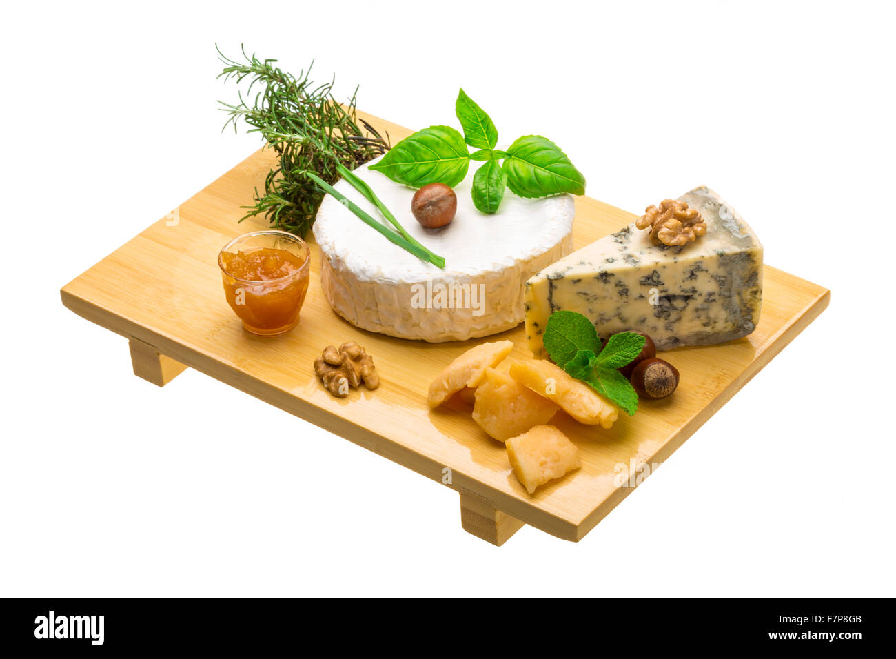 Assorted cheese - brie, dor blue and hard old yellow cheese Stock Photo ...