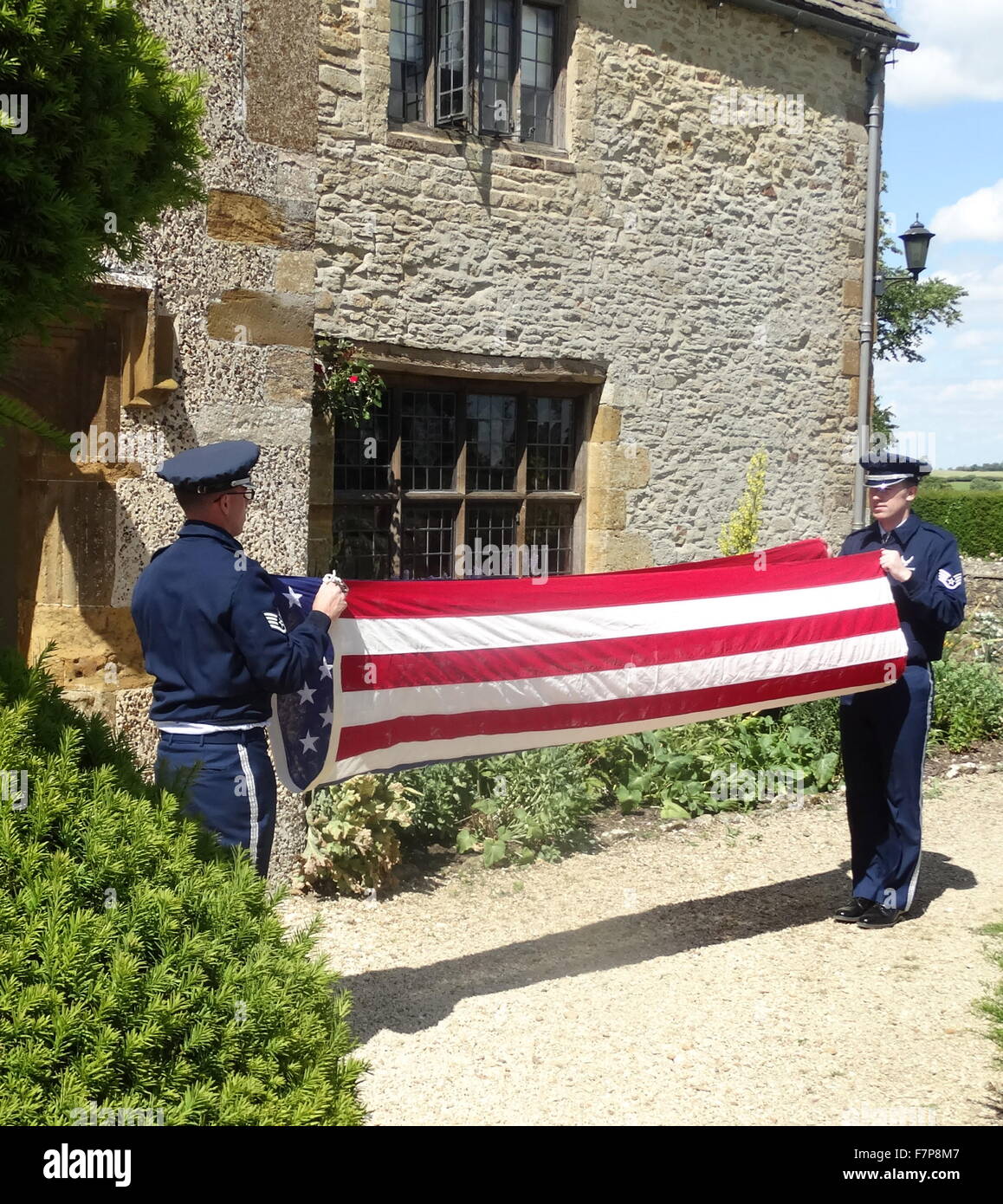 Flag lowering ceremony by US Air force servicemen at Sulgrave Manor ...