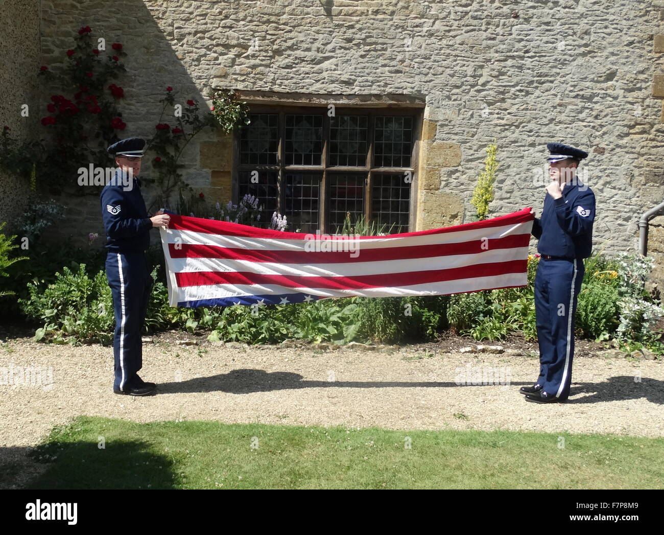 Flag lowering ceremony by US Air force servicemen at Sulgrave Manor ...