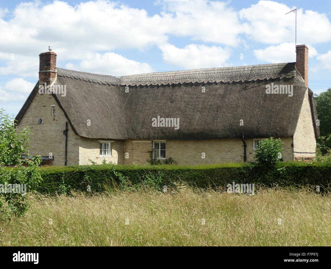 Traditional 17th century thatched cottage on the estate at Sulgrave ...