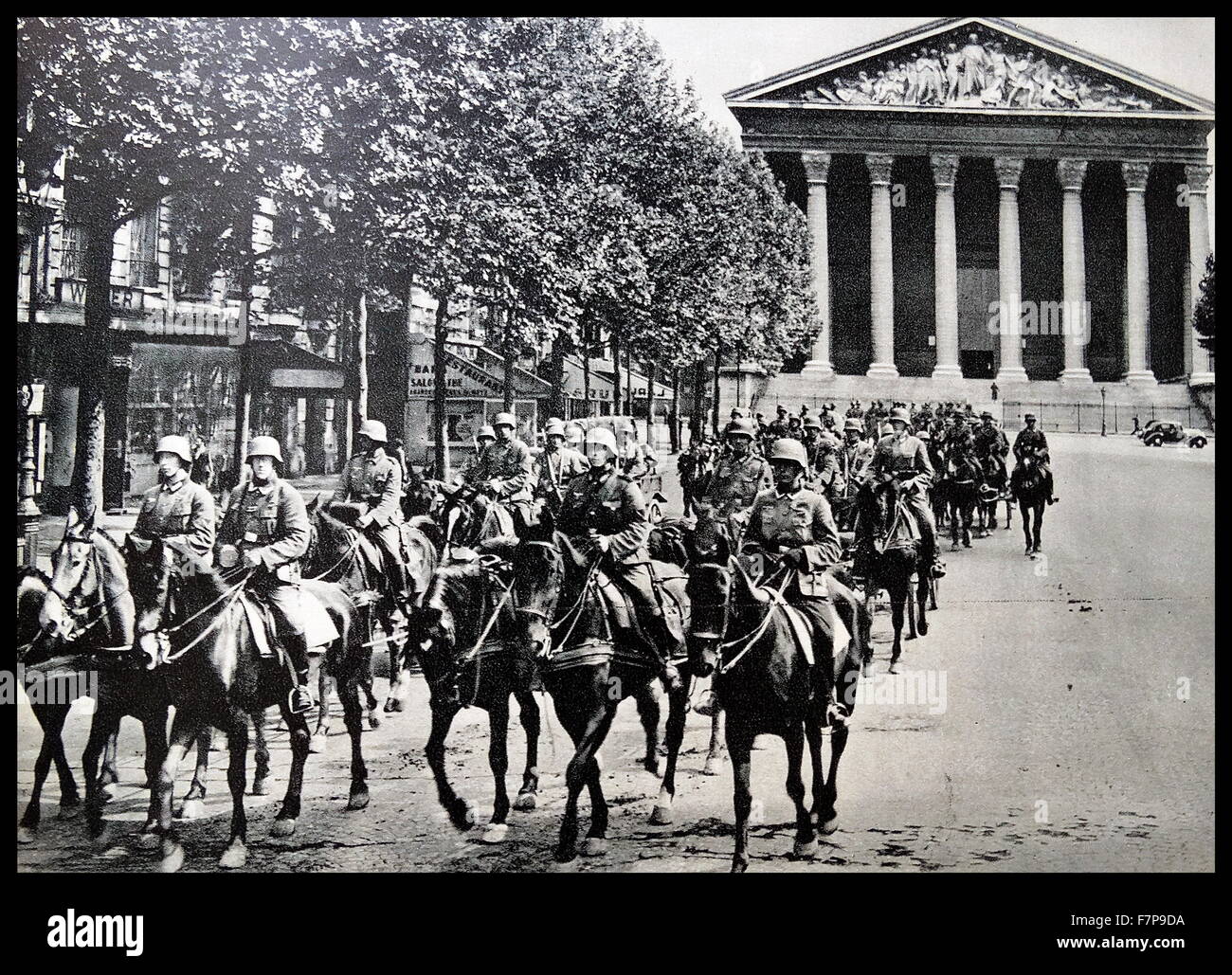 German soldiers marching through Paris, France infront sainte madeleine ...