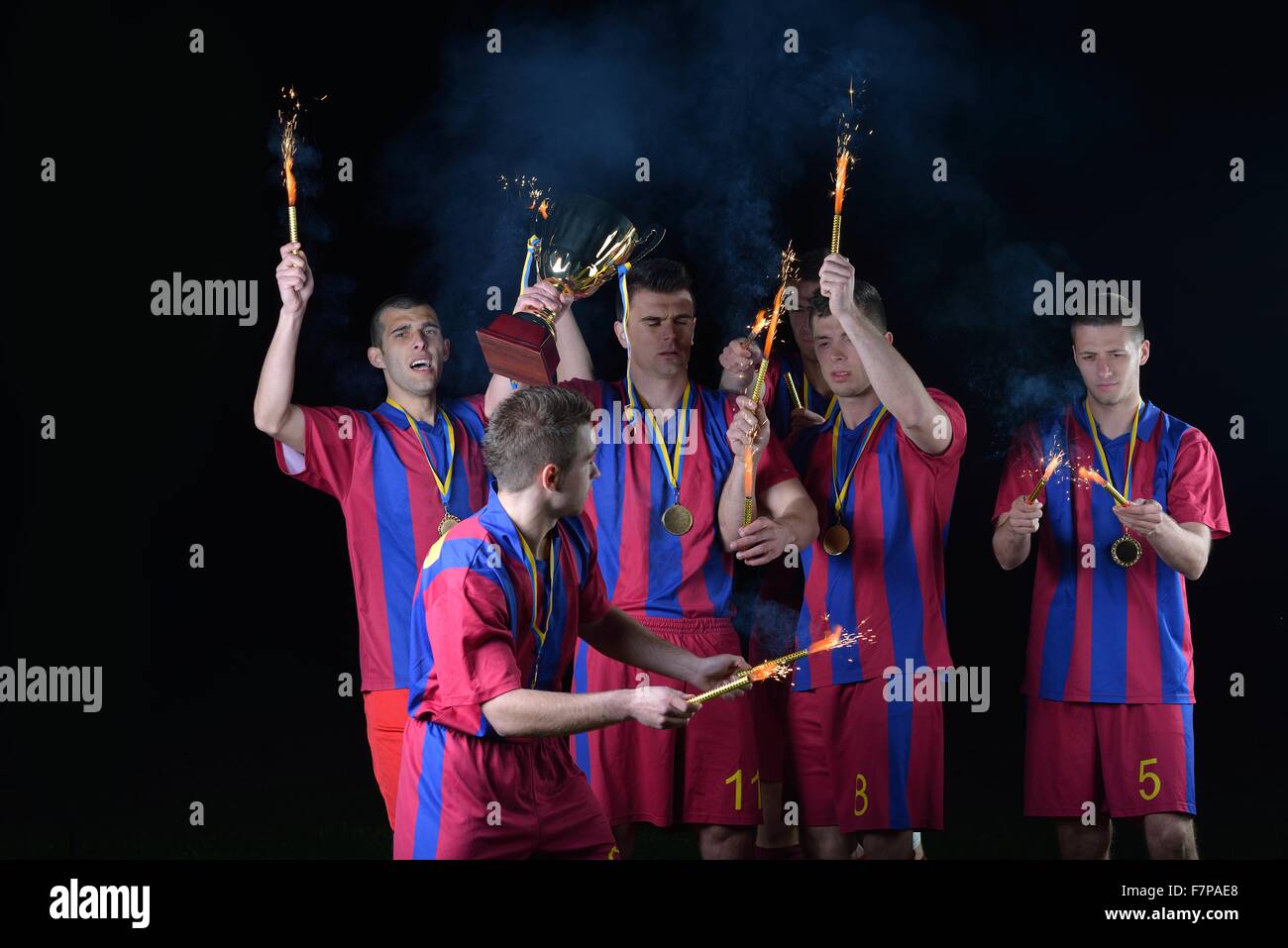 soccer players team group celebrating the victory and become champion ...