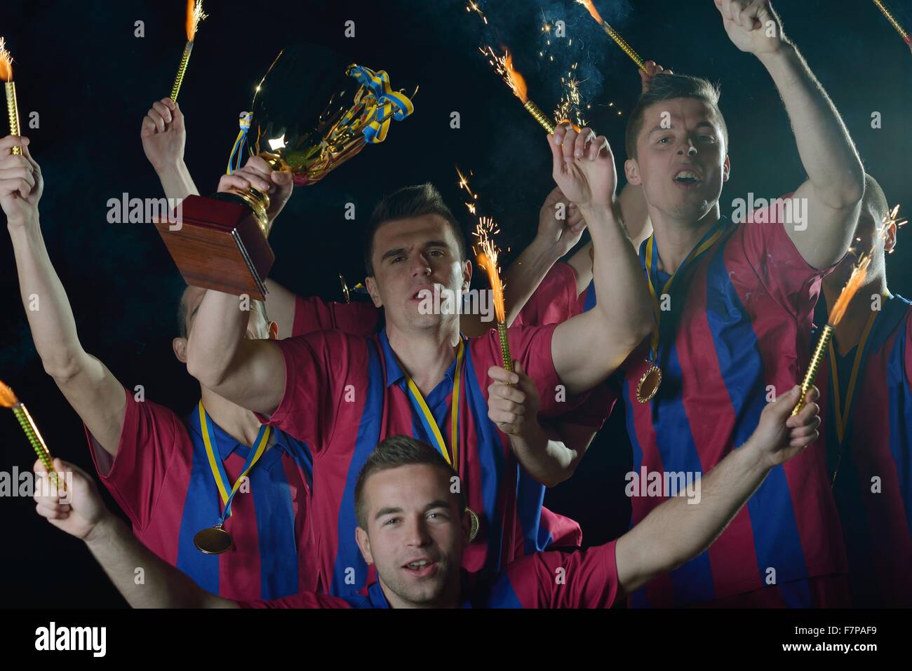 soccer players team group celebrating the victory and become champion ...