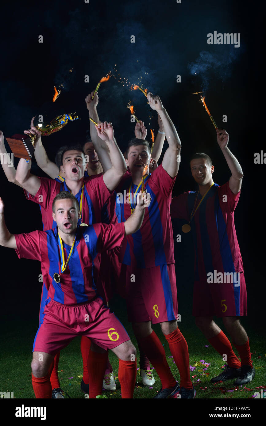 soccer players team group celebrating the victory and become champion ...