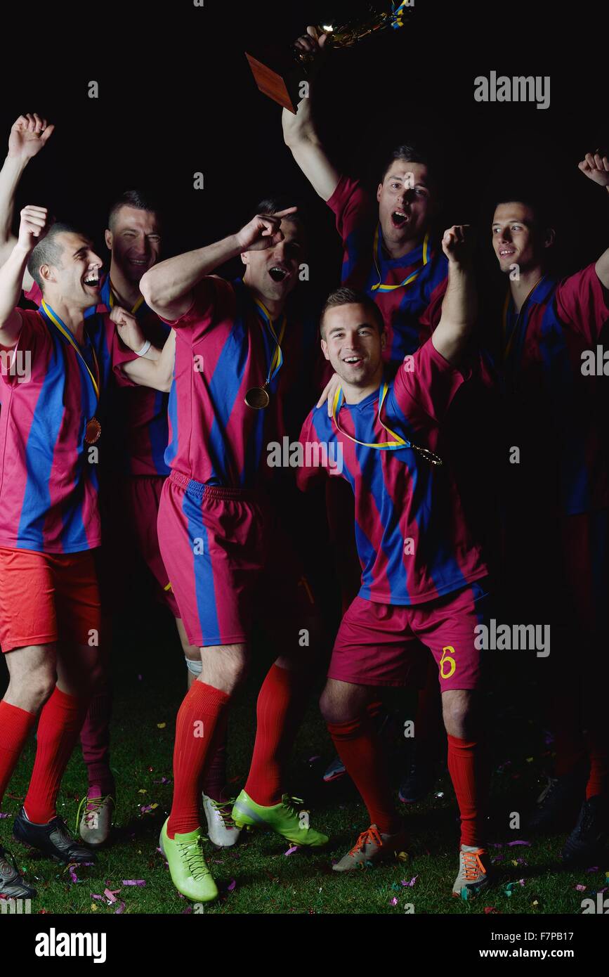soccer players team group celebrating the victory and become champion ...