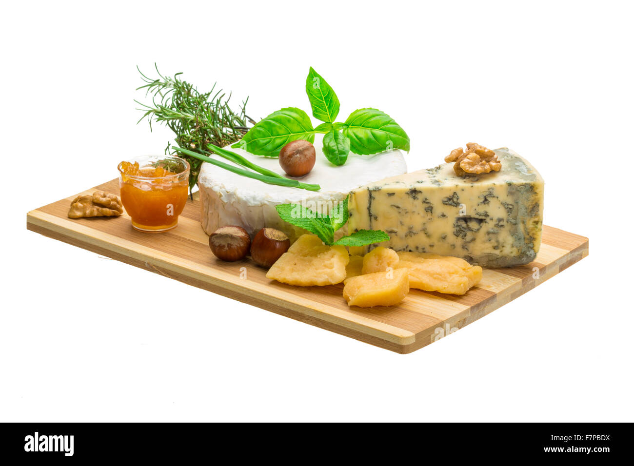 Assorted cheese - brie, dor blue and hard old yellow cheese Stock Photo ...