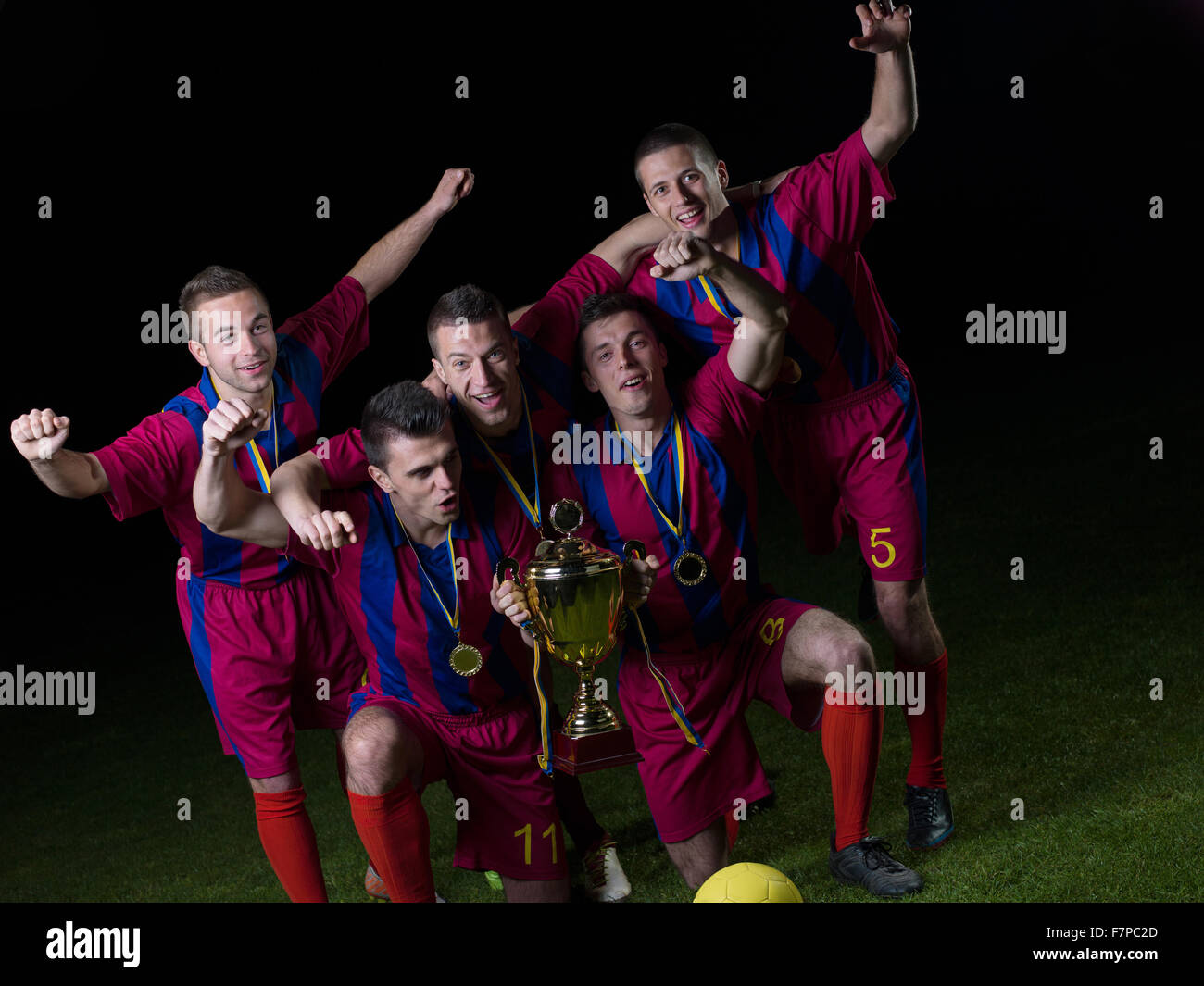 soccer players team group celebrating the victory and become champion ...
