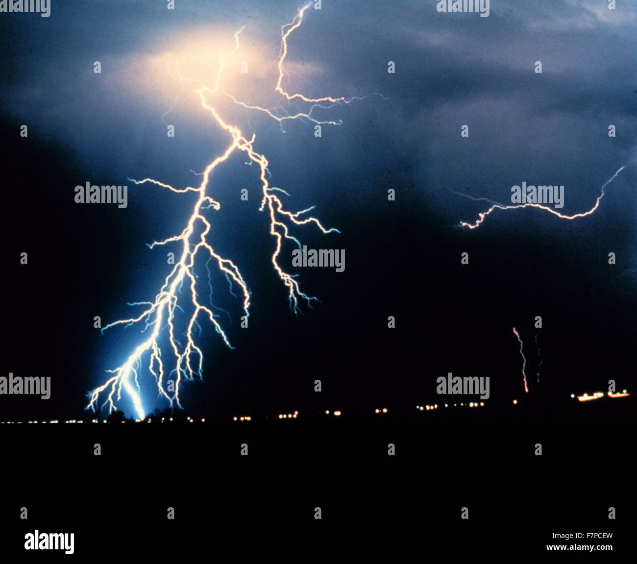Multiple lightning strikes during a night-time thunderstorm Stock Photo ...