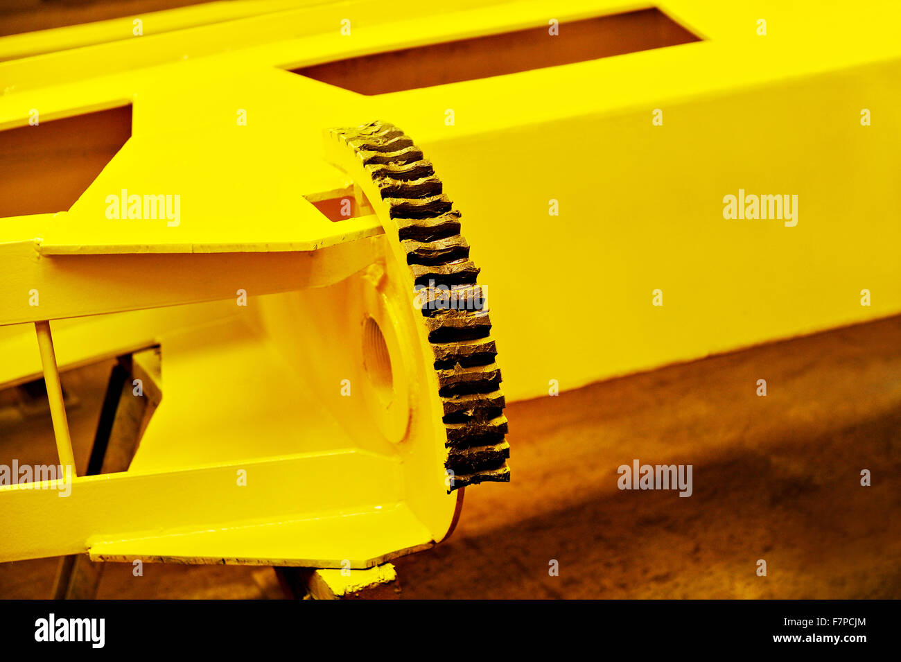 Big industrial yellow gear with grease on it Stock Photo - Alamy
