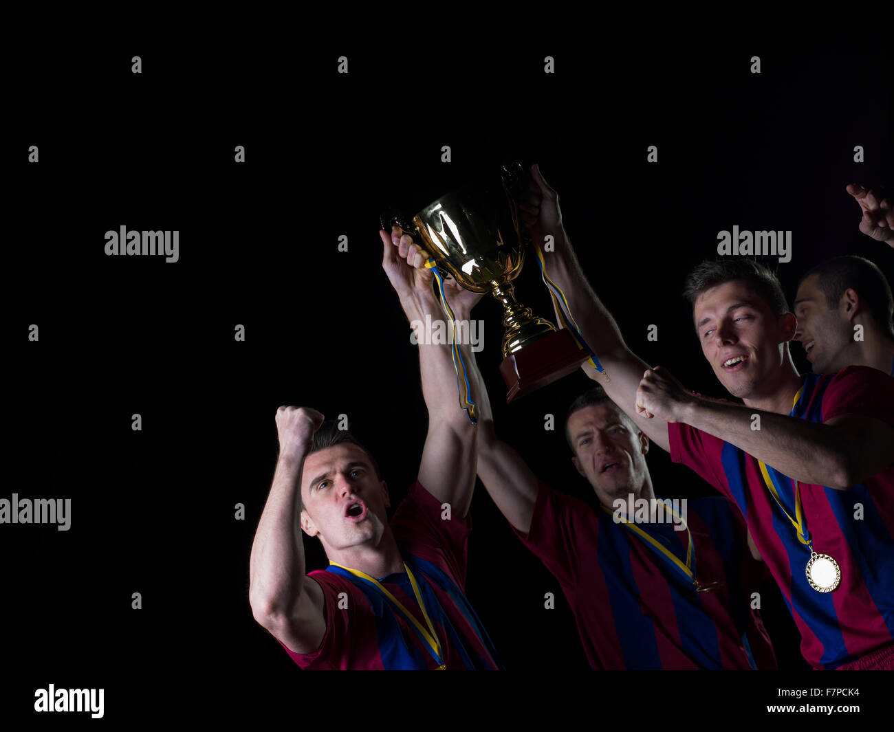 soccer players team group celebrating the victory and become champion ...