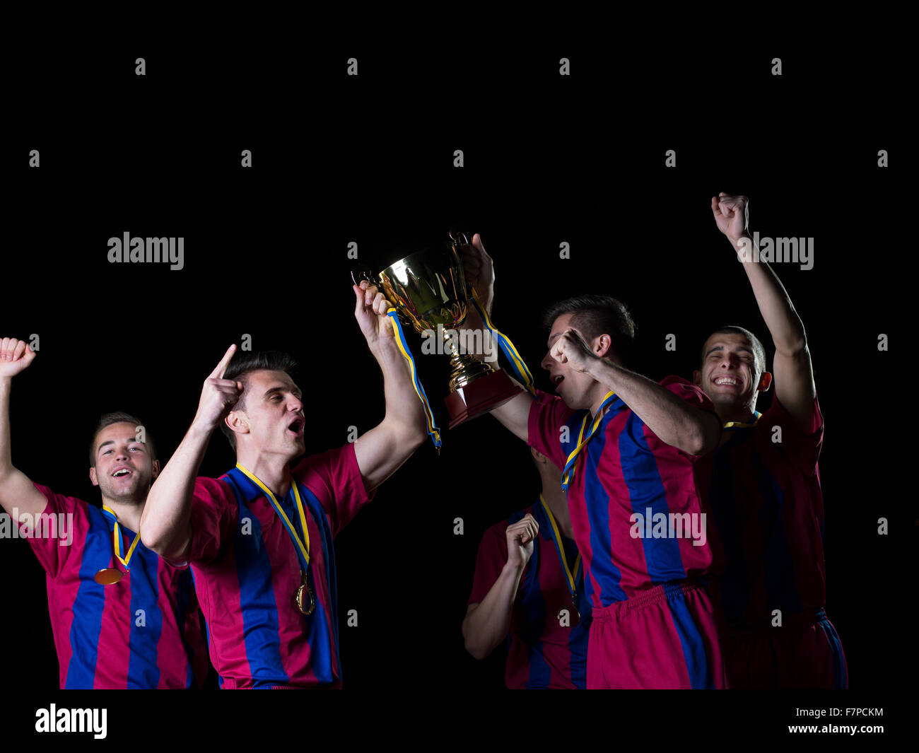 soccer players team group celebrating the victory and become champion ...