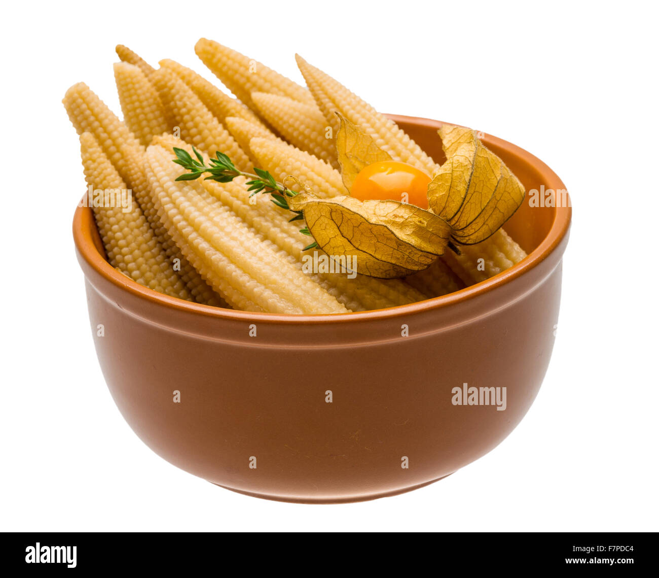 Baby corn with thyme Stock Photo - Alamy