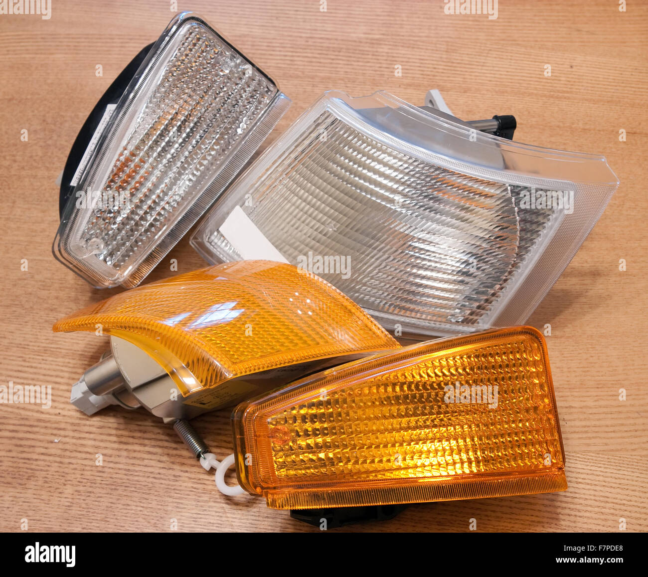 new automobile headlamp on wooden table Stock Photo - Alamy