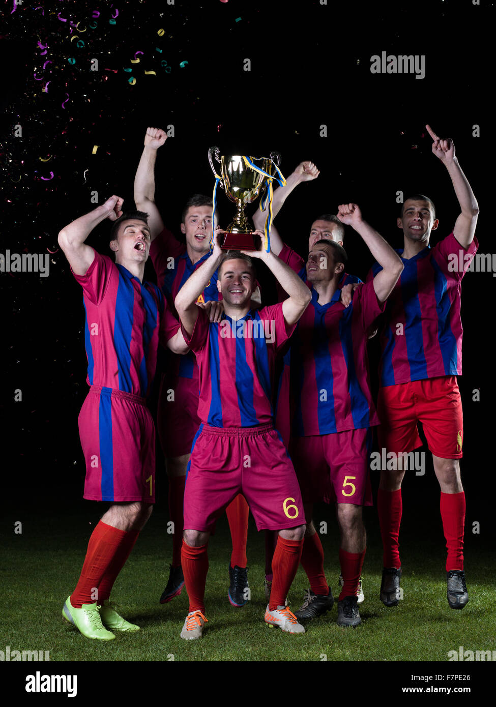 soccer players team group celebrating the victory and become champion ...