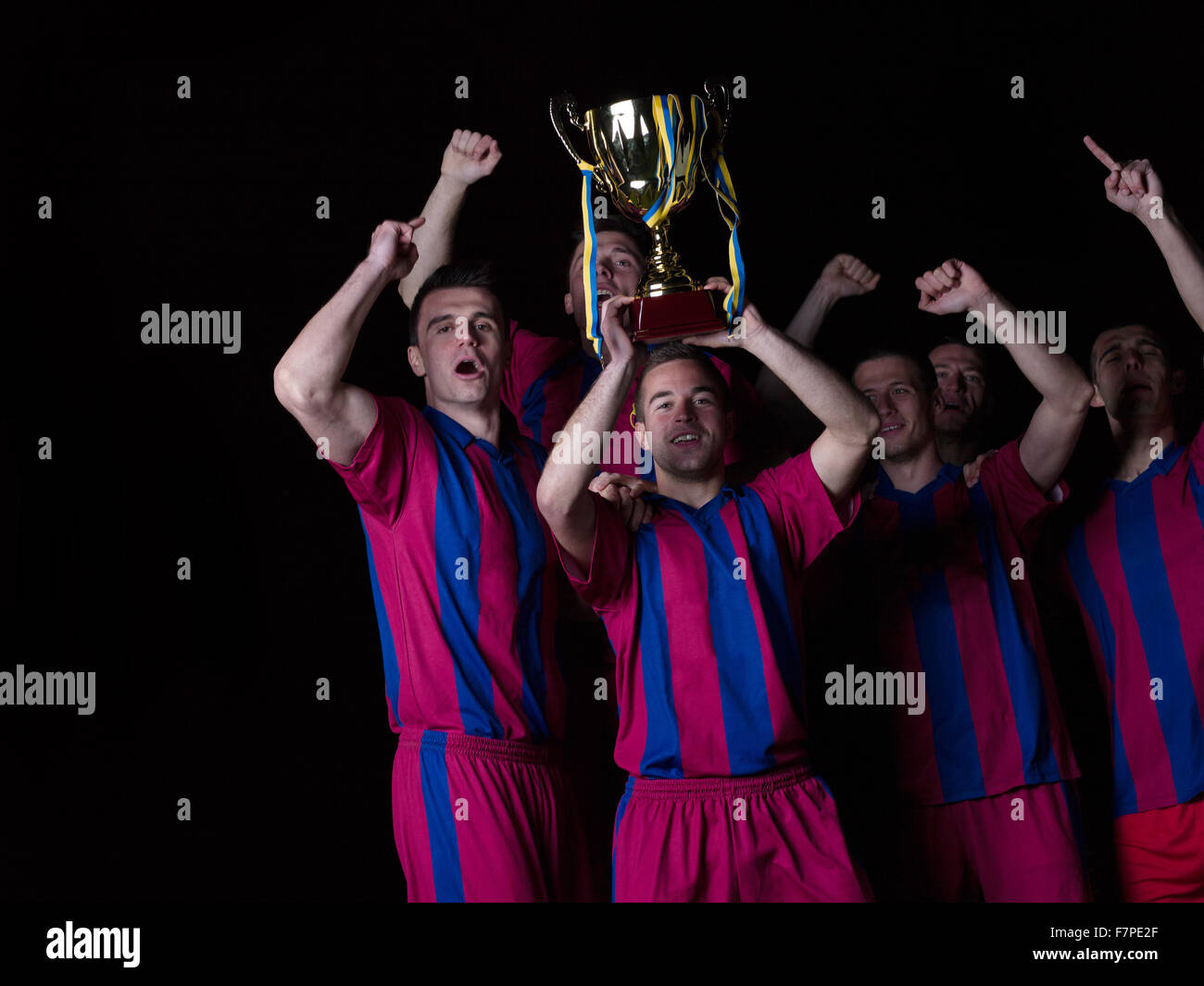 soccer players team group celebrating the victory and become champion ...