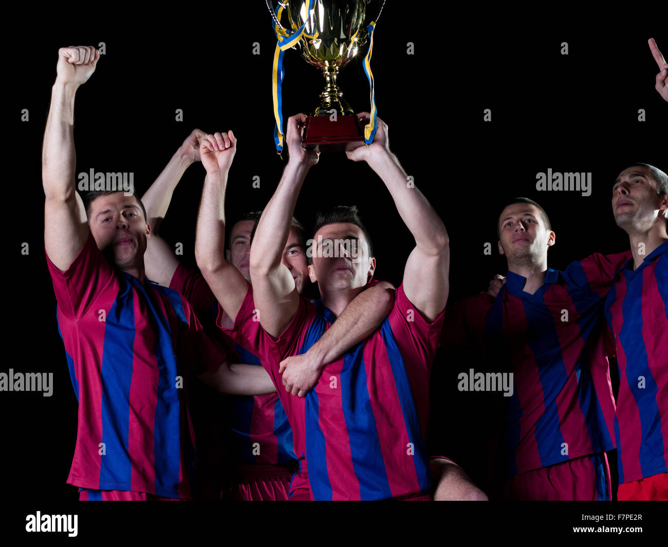 soccer players team group celebrating the victory and become champion ...