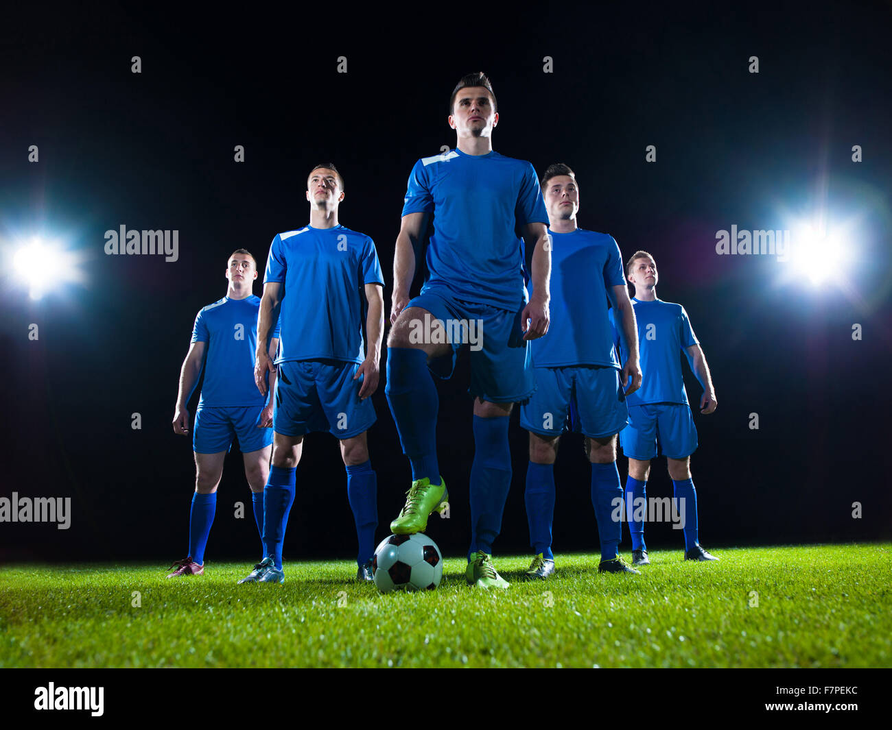 soccer players team group isolated on black background Stock Photo - Alamy