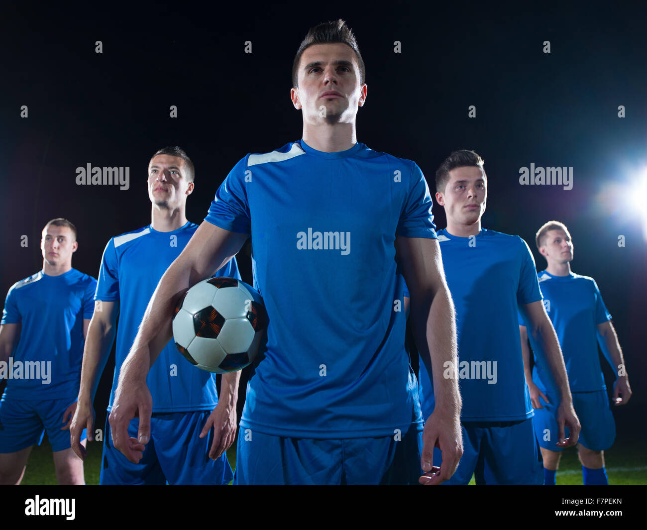 soccer players team group isolated on black background Stock Photo - Alamy