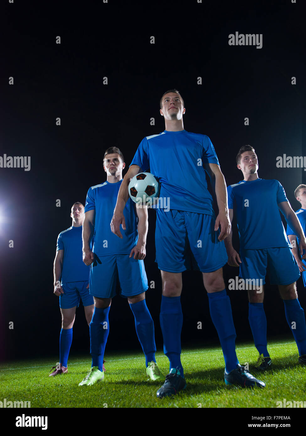 soccer players team group isolated on black background Stock Photo - Alamy
